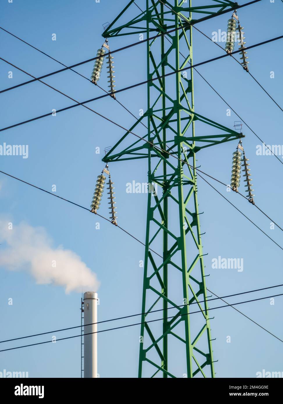 Factory chimney with smoke. Industrial pipe. Power line tower Stock ...