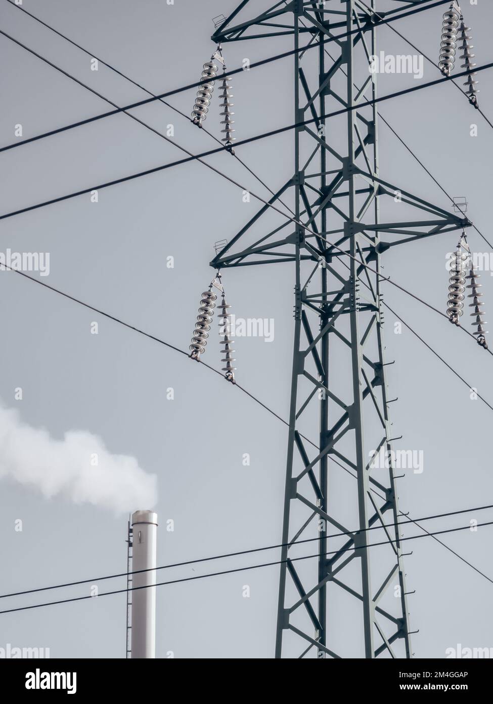 Factory chimney with smoke. Industrial pipe. Power line tower Stock ...