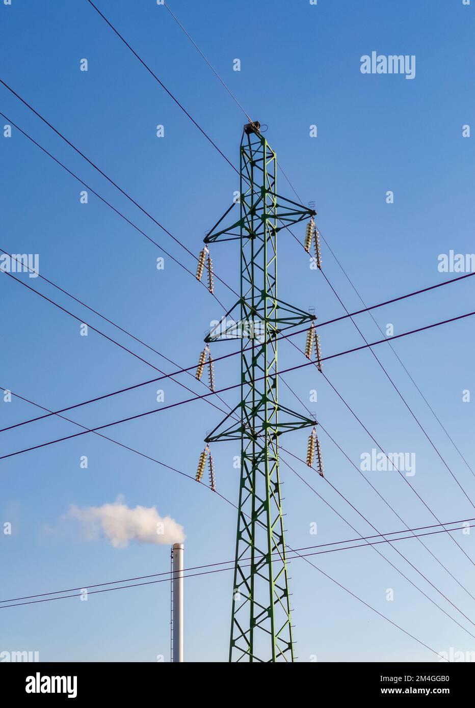 Factory chimney with smoke. Industrial pipe. Power line tower Stock ...