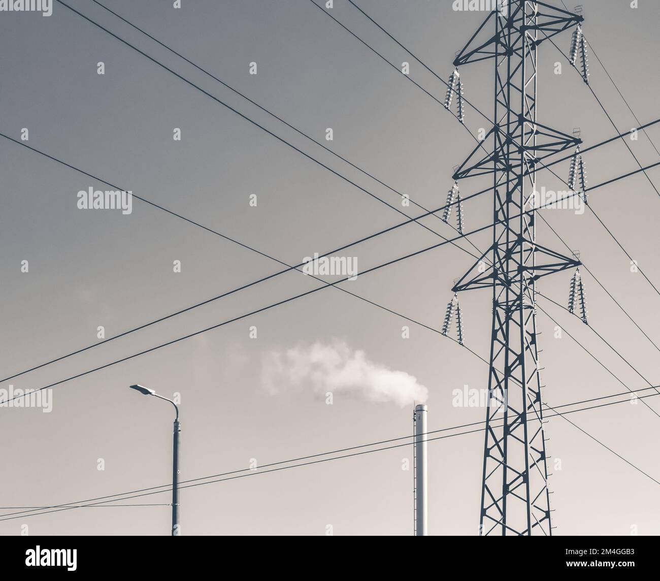 Factory chimney with smoke. Industrial pipe. Power line tower Stock ...