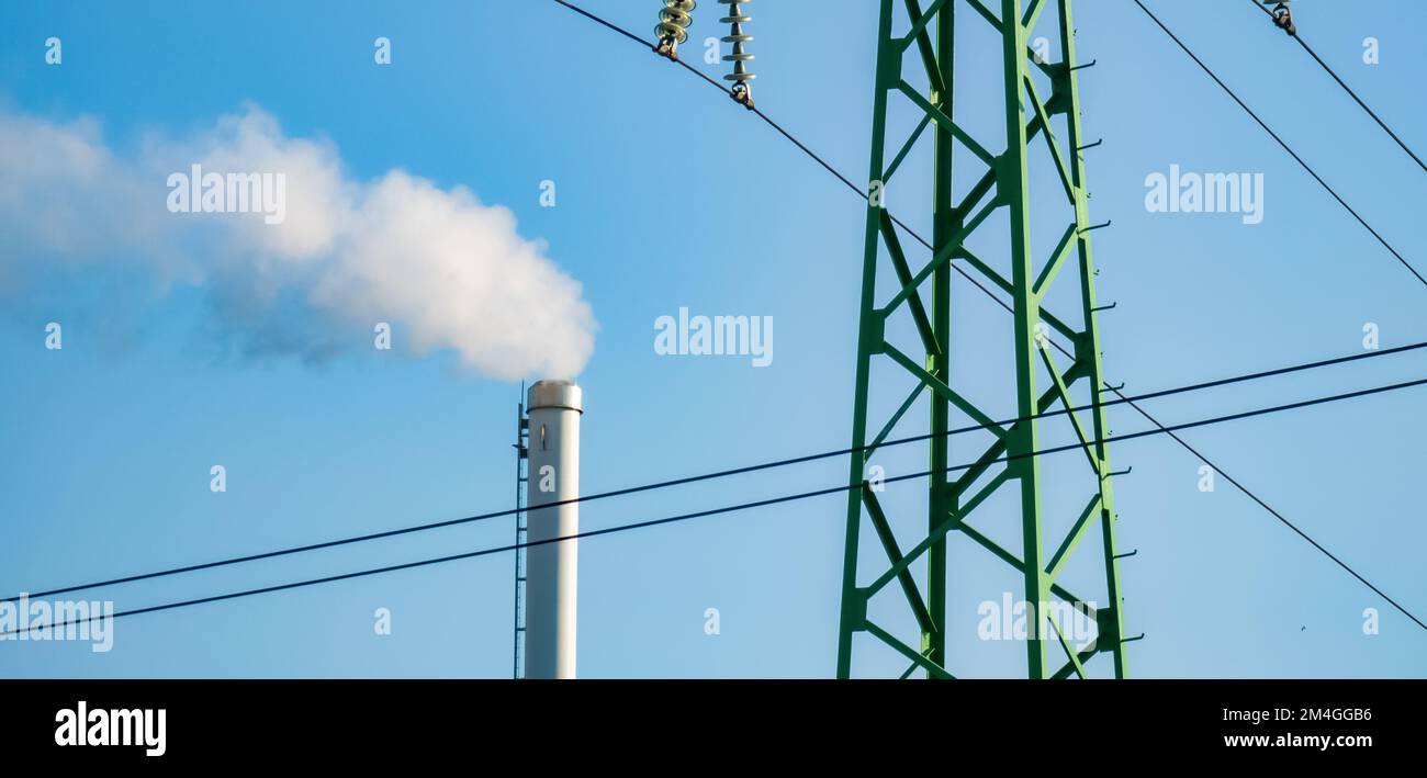 Factory chimney with smoke. Industrial pipe. Power line tower Stock ...