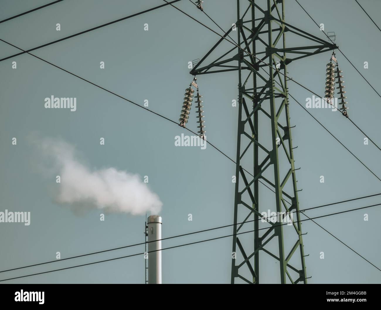 Factory chimney with smoke. Industrial pipe. Power line tower Stock ...