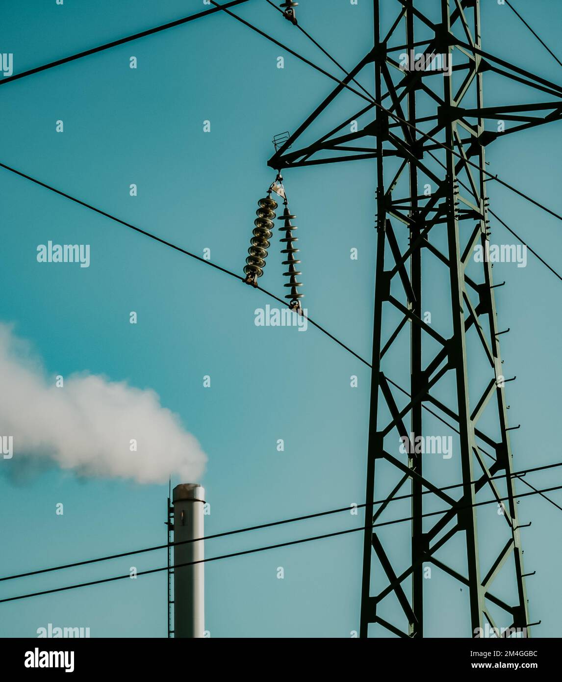 Factory chimney with smoke. Industrial pipe. Power line tower Stock ...