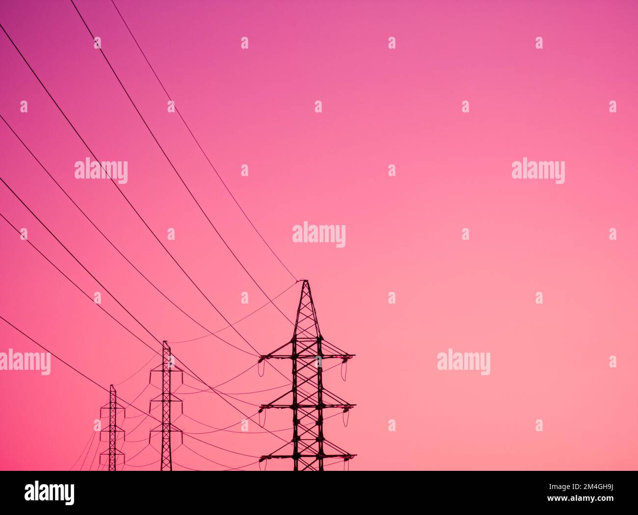 High voltage electricity power line towers against the sky Stock Photo ...