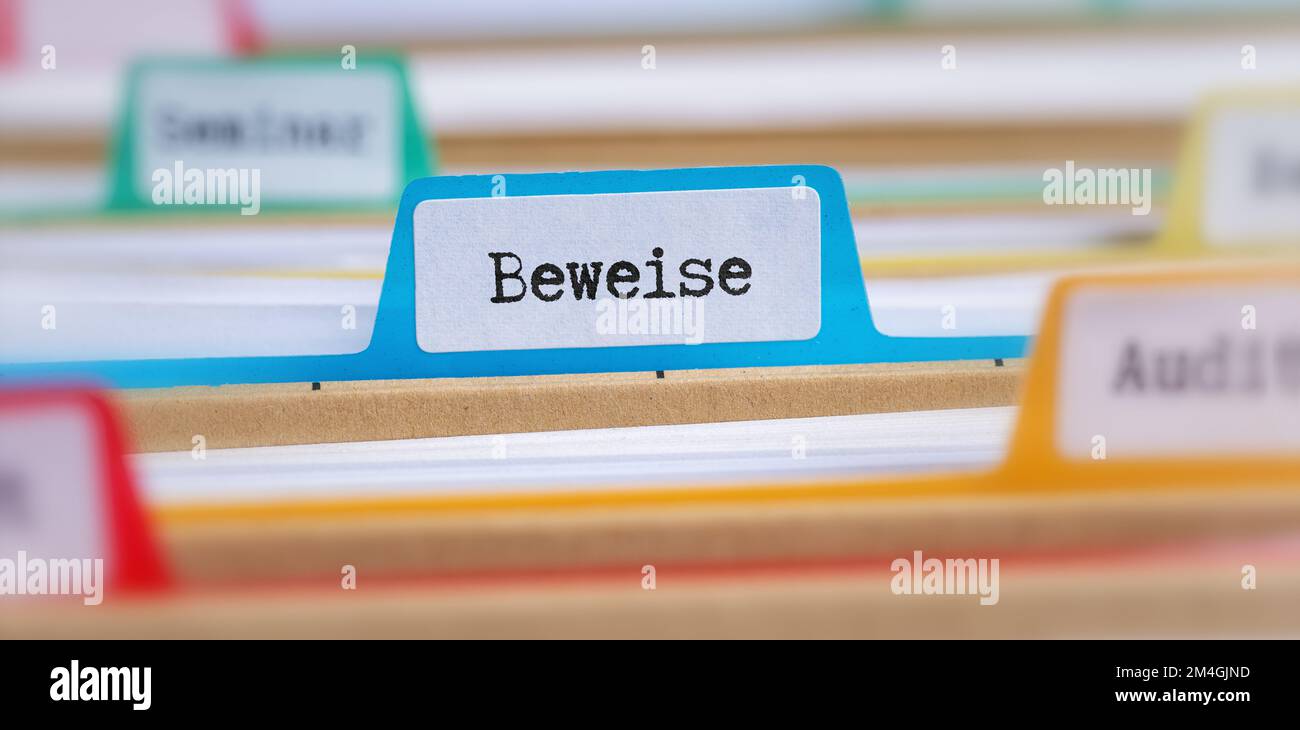 File folders with a tab labeled Evidence in german - Beweise Stock ...