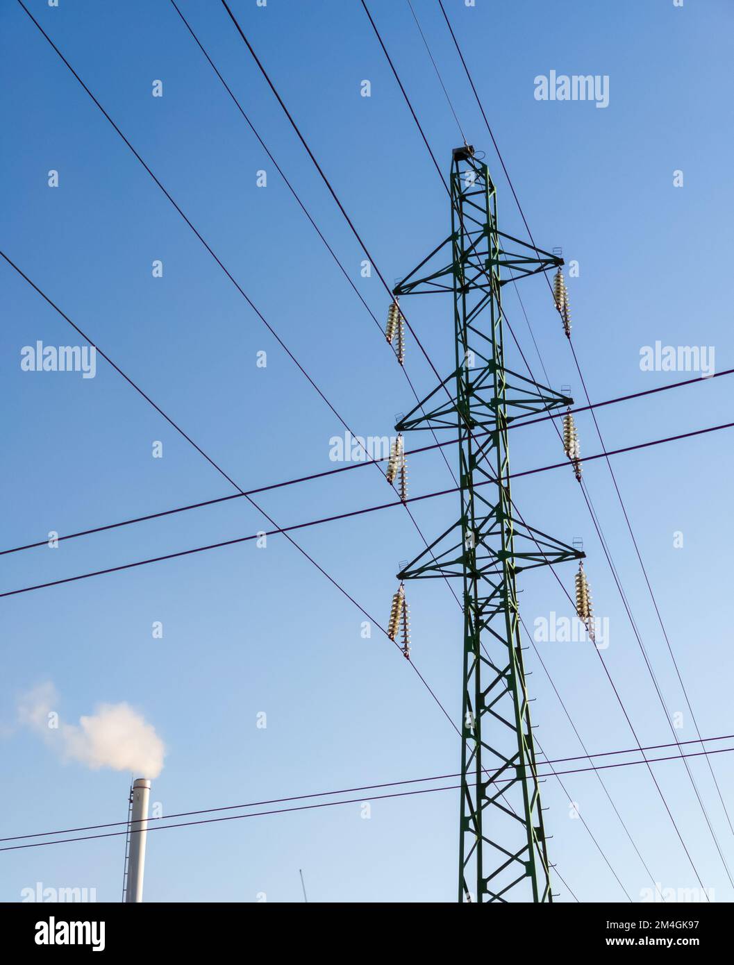 Factory chimney with smoke. Industrial pipe. Power line tower Stock ...