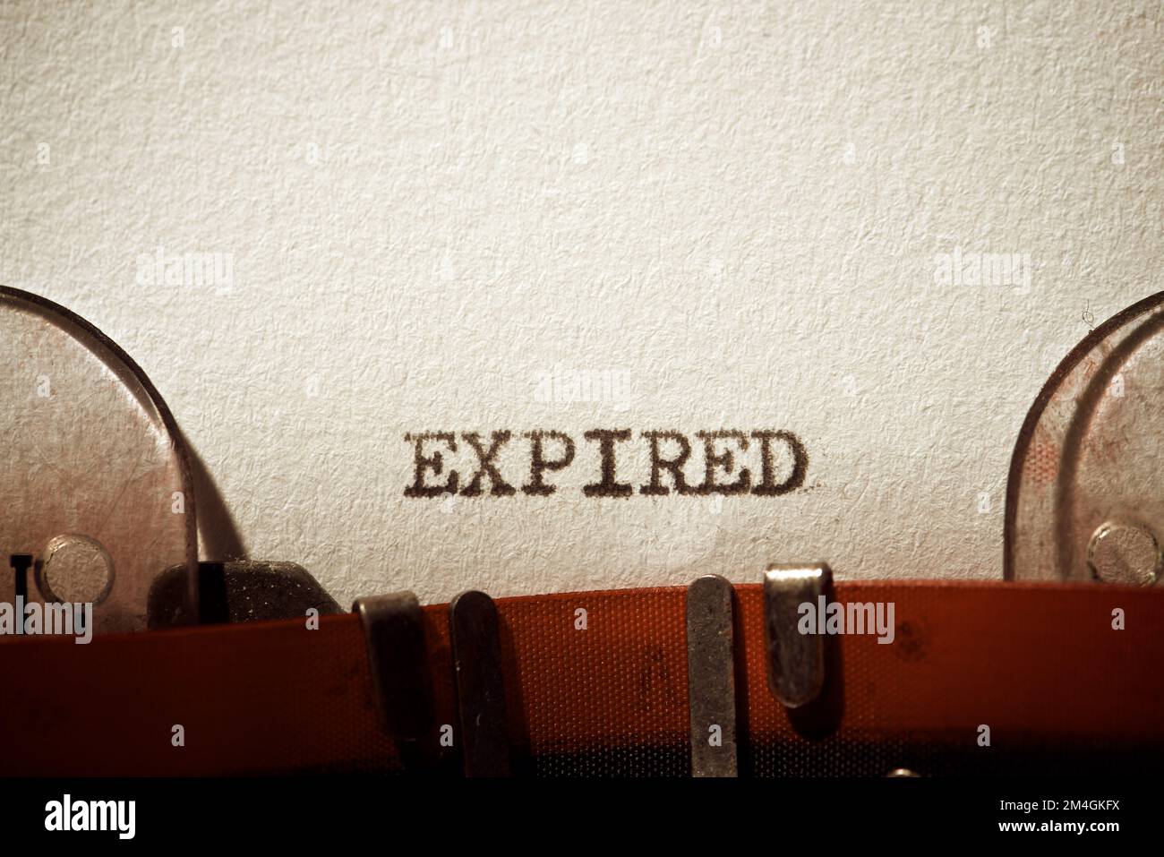 Expired word written with a typewriter Stock Photo - Alamy