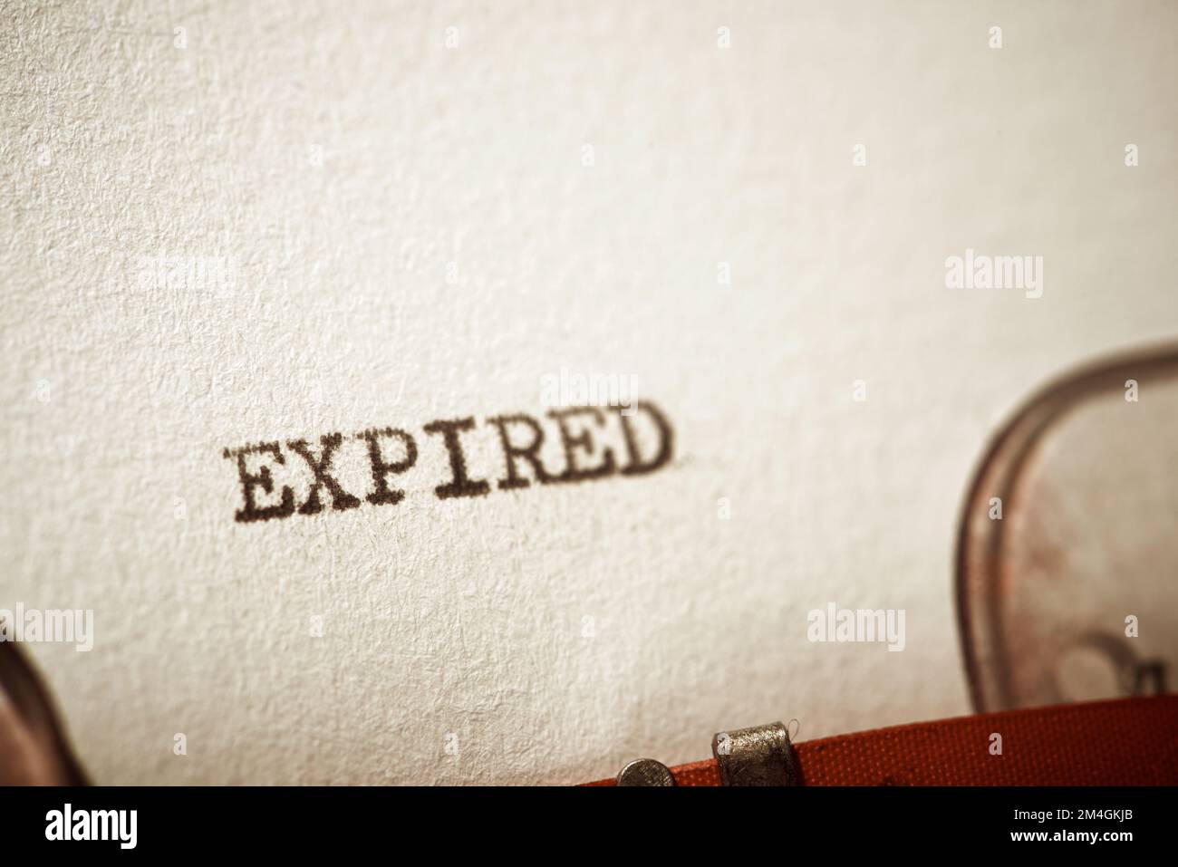 Expired word written with a typewriter Stock Photo - Alamy