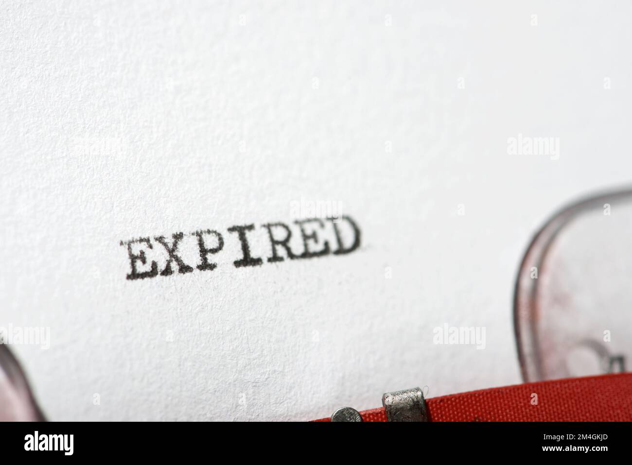 Expired word written with a typewriter Stock Photo - Alamy