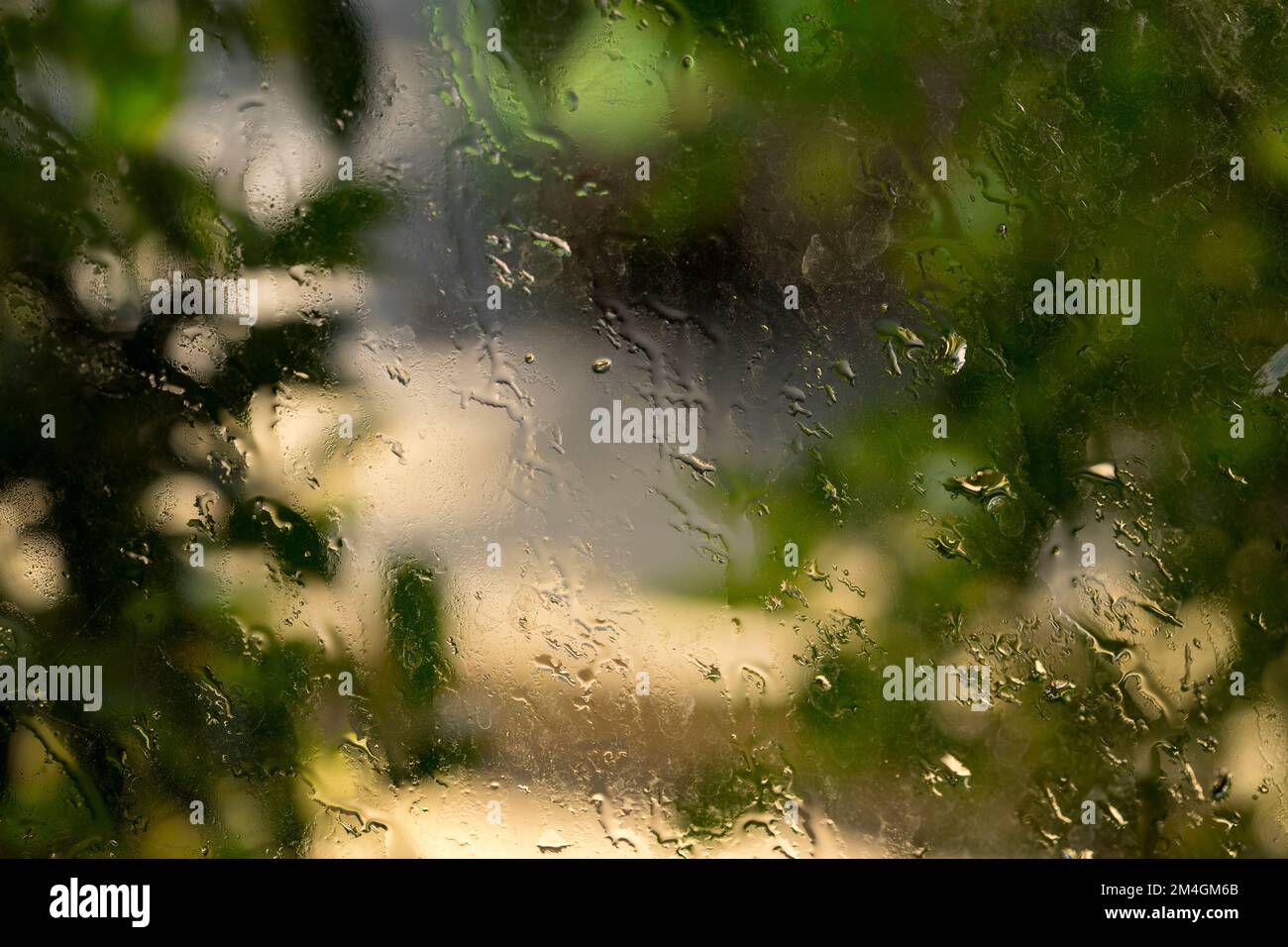 Close up dry water stains on the glass window, water drops of rain on a ...