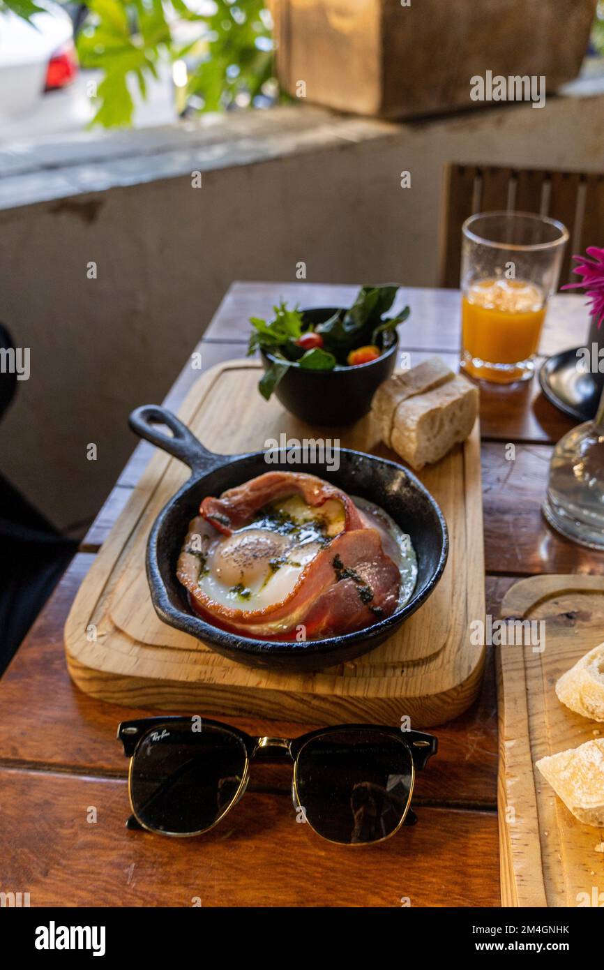 traditional full breakfast in mexico, with sauces, juices, pans as hot ...