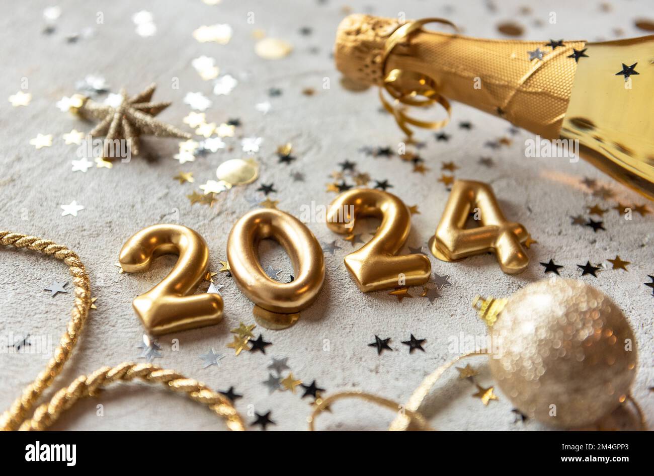 Golden color palette photo with new year 2024 numbers surrounded by ...