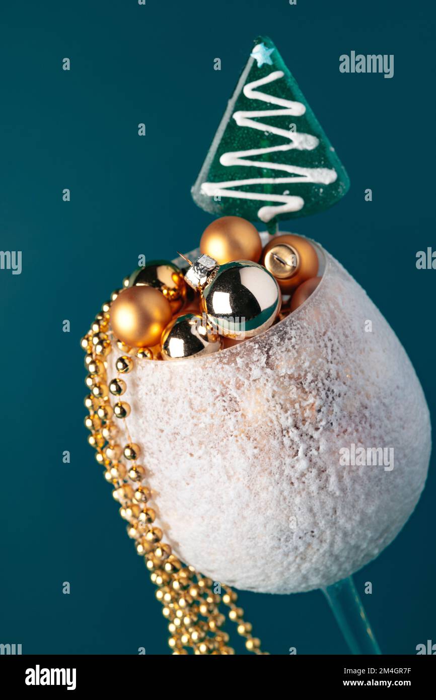 Little christmas baubles in wineglasses on a dark background Stock ...