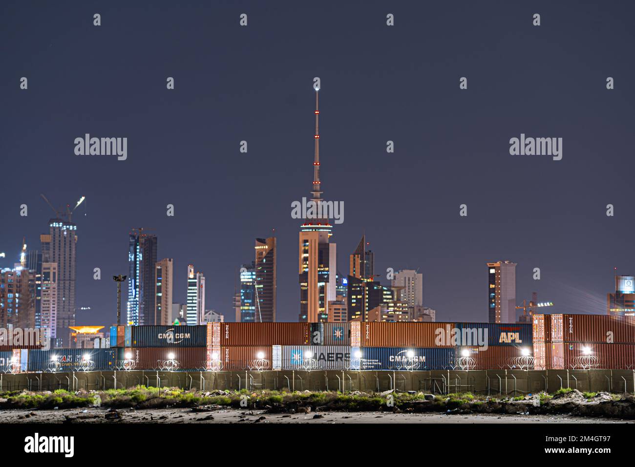 A beautiful view of Kuwait liberation tower behind the industrial area ...