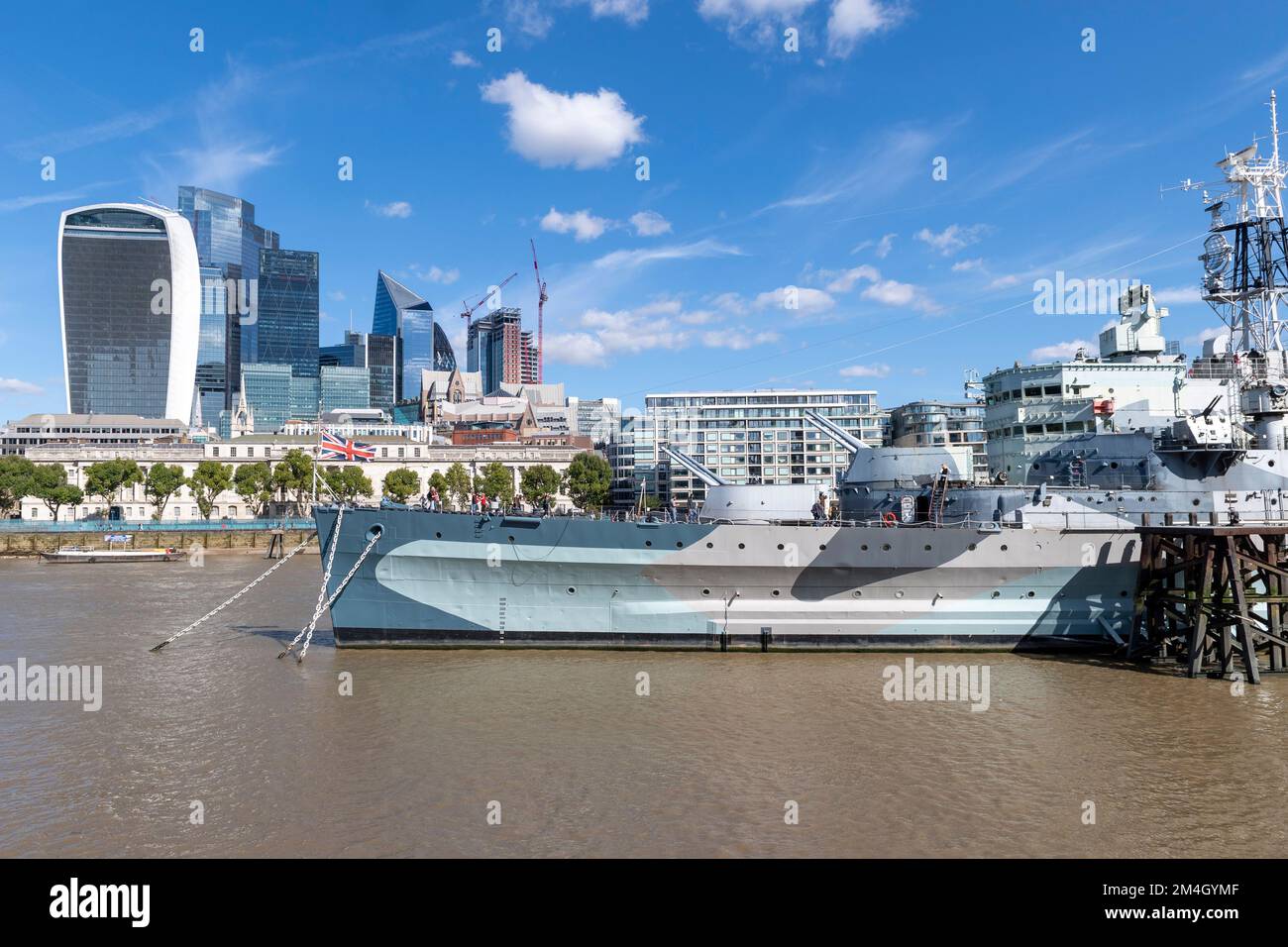 HMS Belfast museum ship with City of London skyline of office blocks in ...