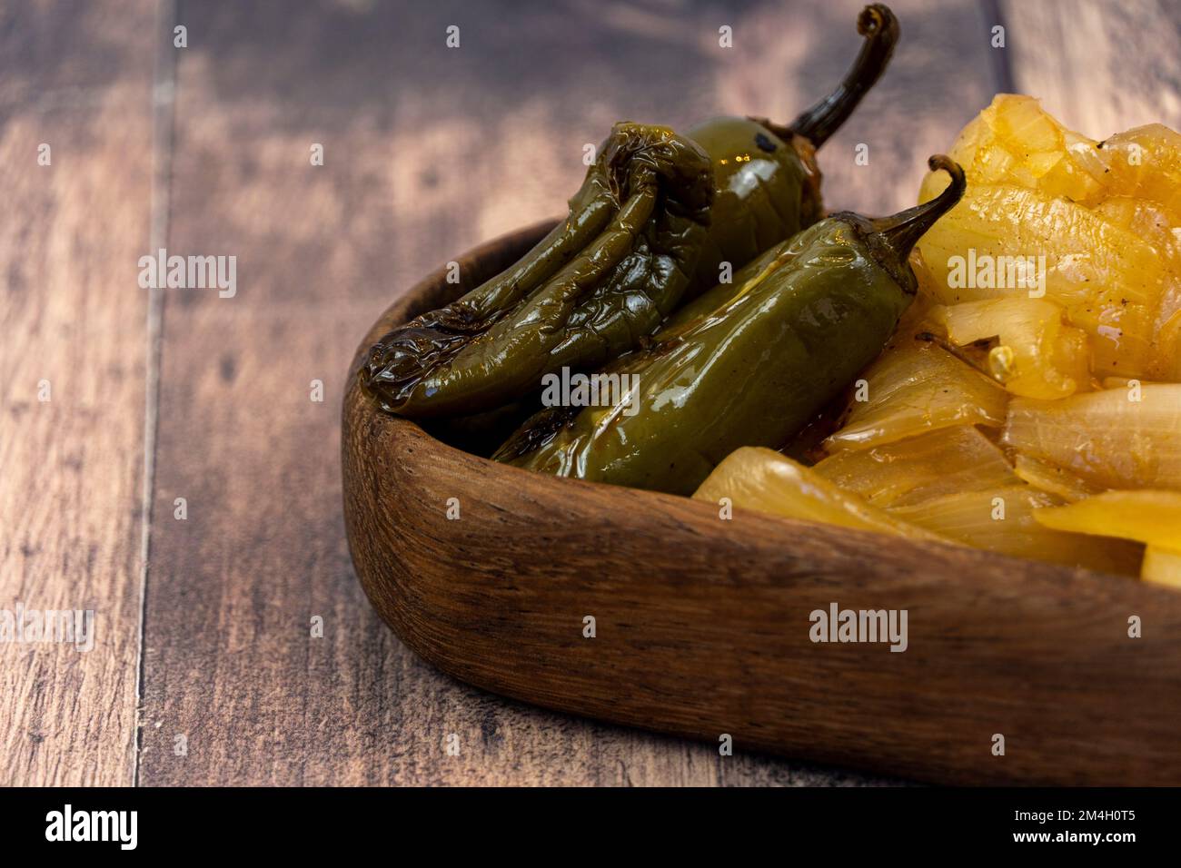 torta ahogada consome y birria, dish with onion, sweet onion and chile ...