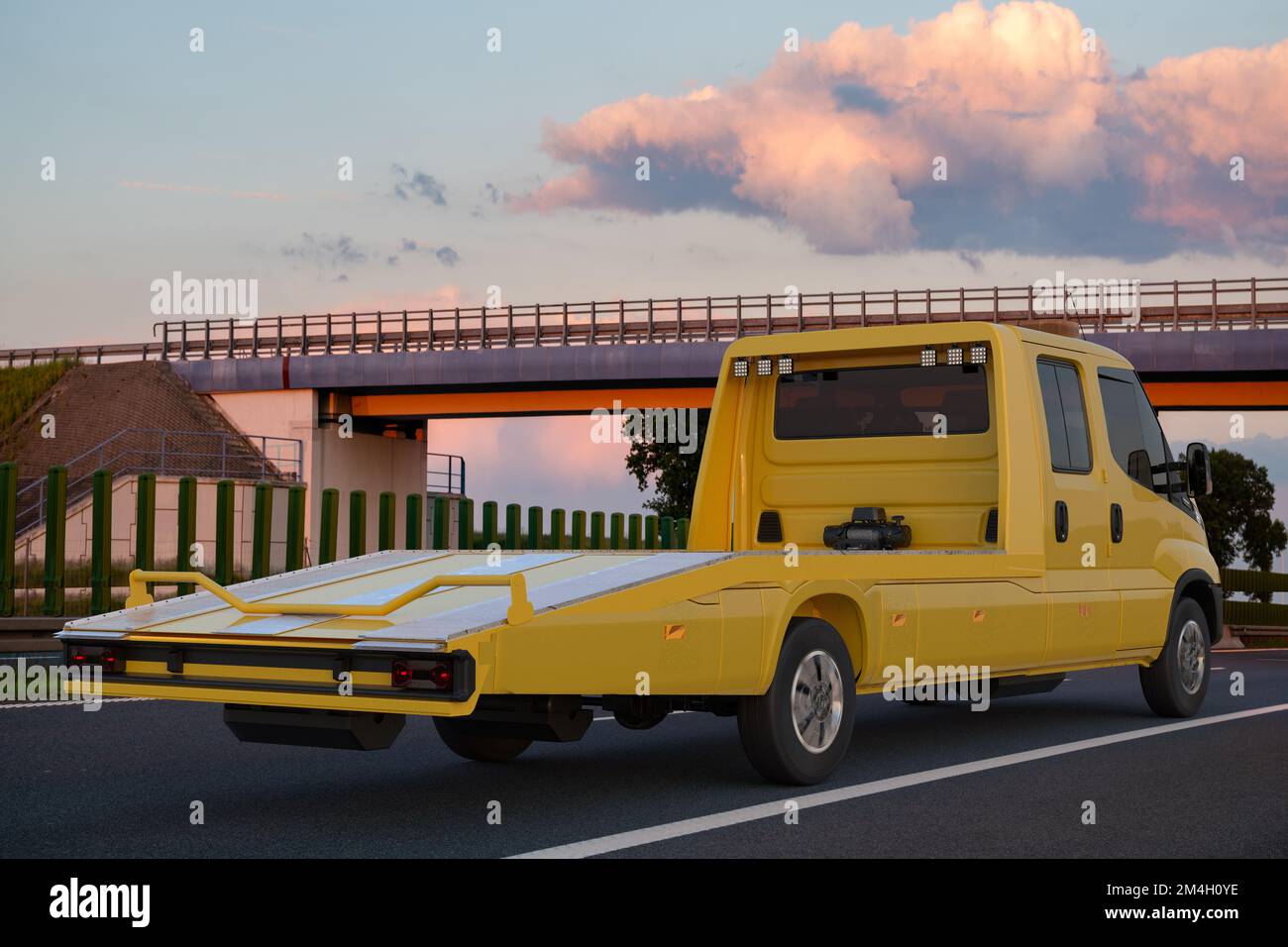 Tow Car driving on the highway Stock Photo - Alamy