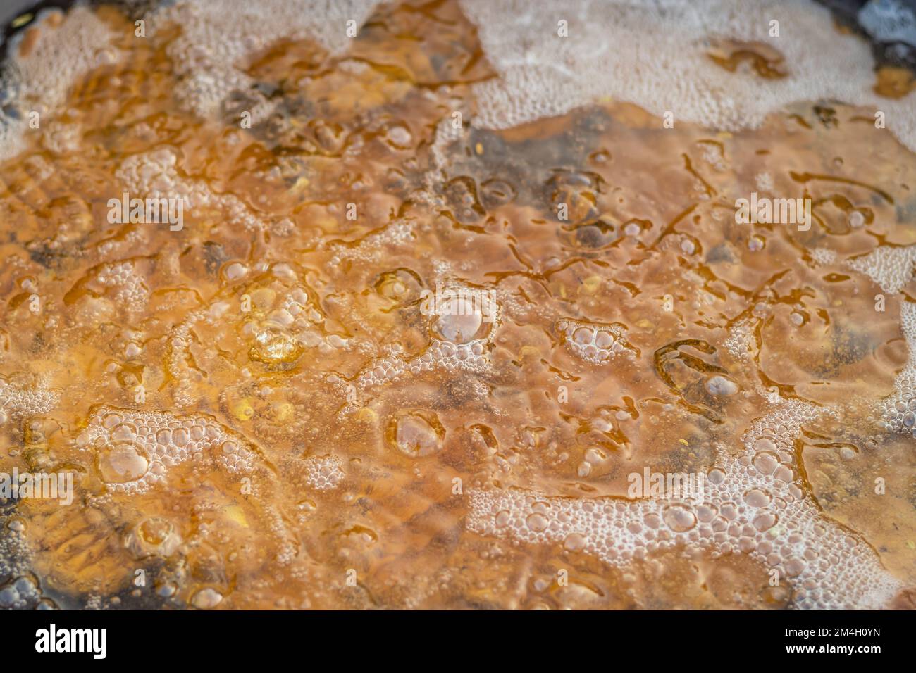 hot boiling refined oil from flat angle Stock Photo - Alamy