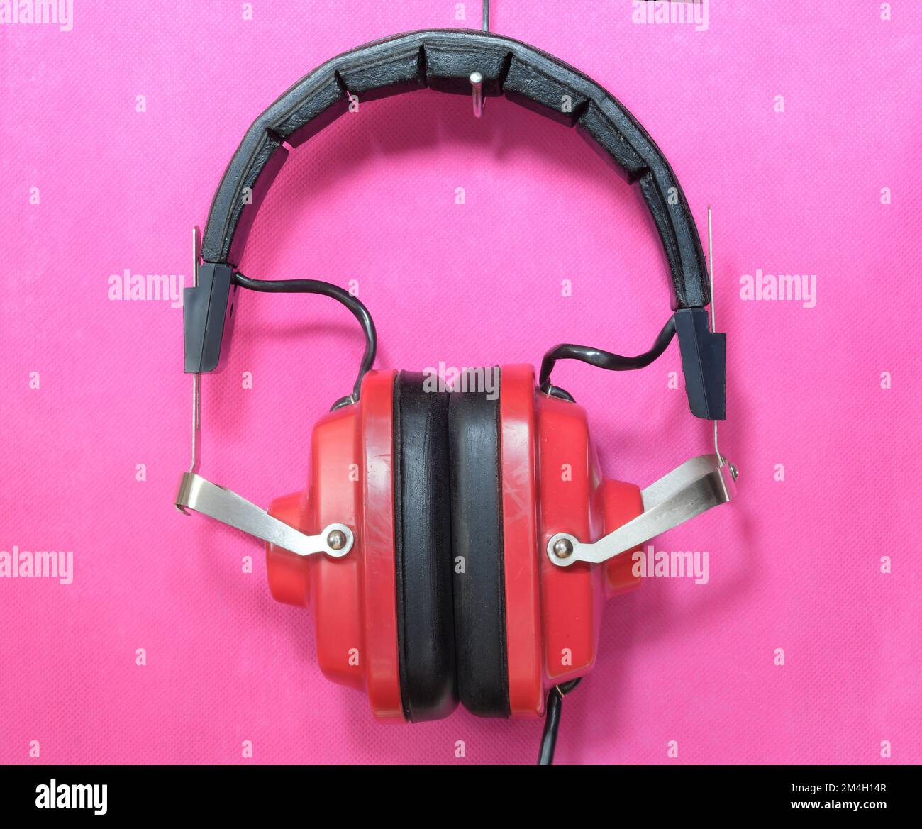 Vintage red headphones on grungy green background, podcast,recording ...
