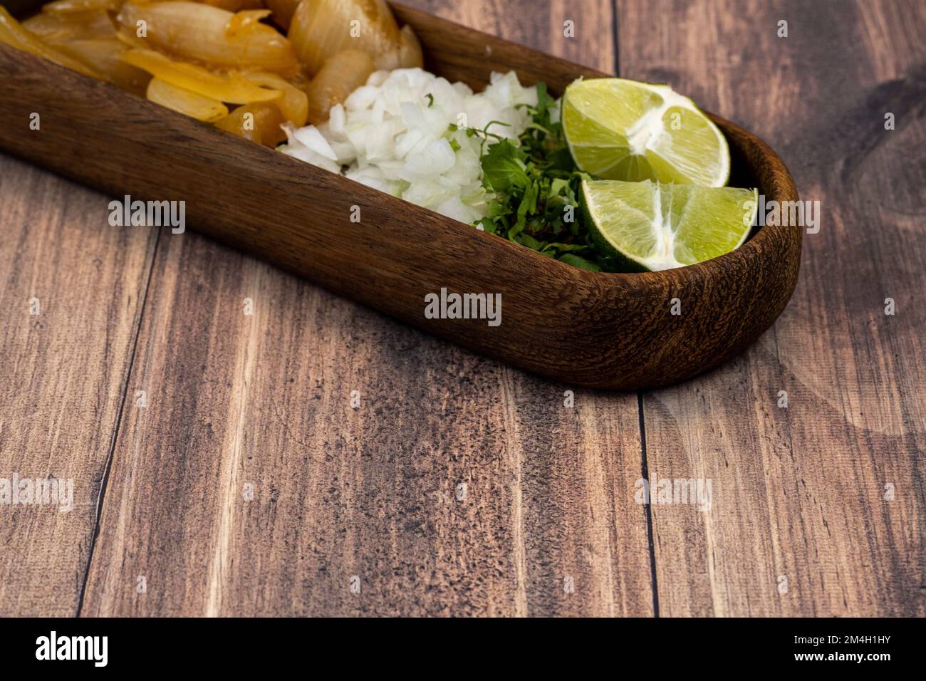 torta ahogada consome y birria, dish with onion, sweet onion and chile ...