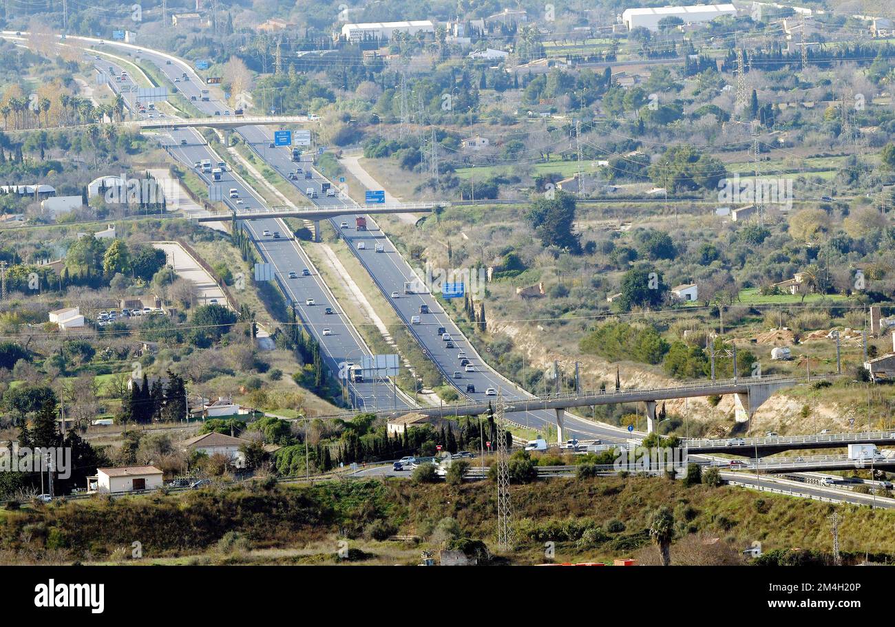 Aerial view of the Palma-Alcudia highway (Ma-13), passing through Inca ...