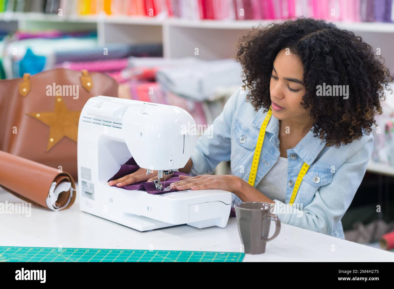 fashion designer with sewing pattern Stock Photo - Alamy