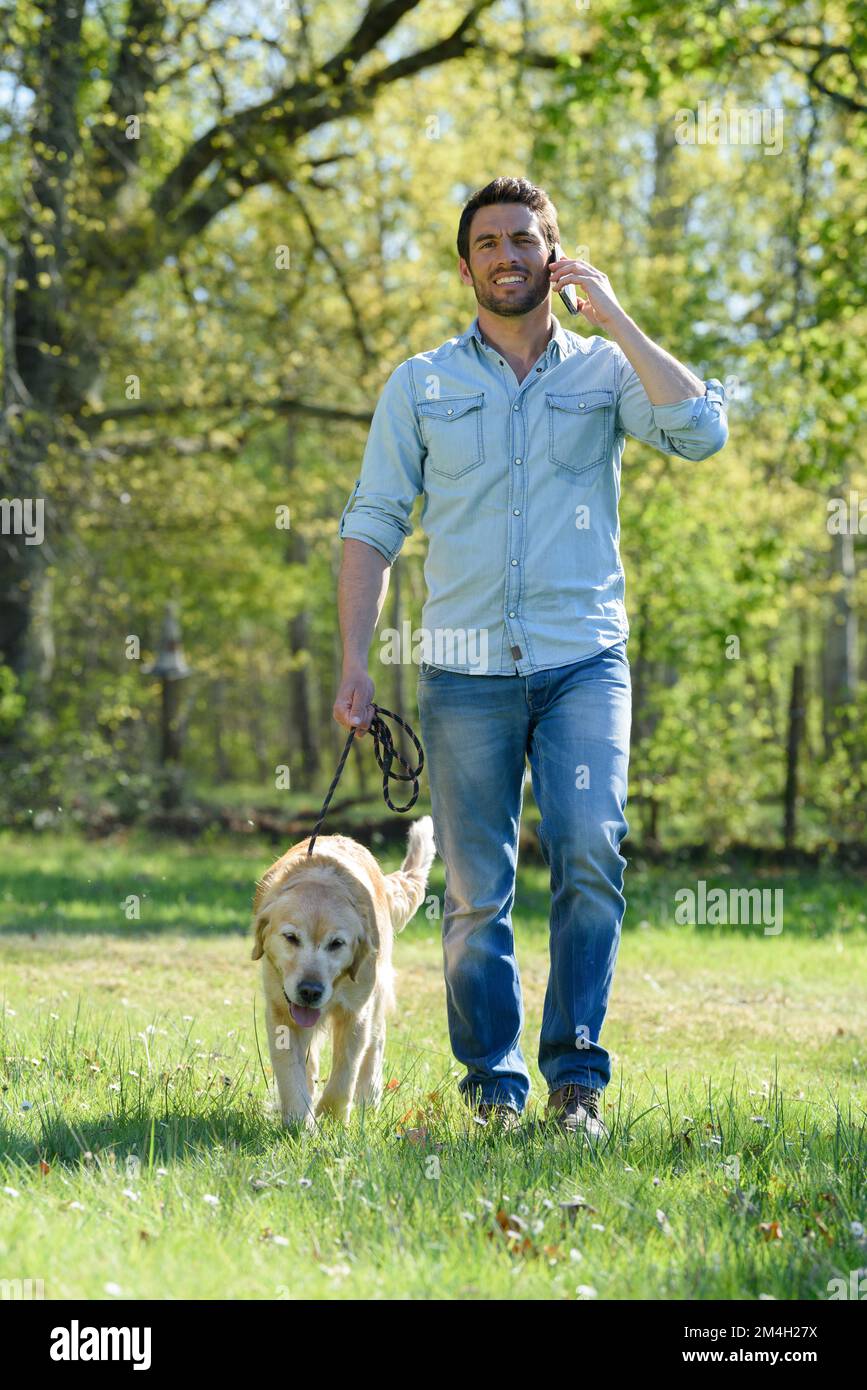 Man talking dog walk hi-res stock photography and images - Alamy