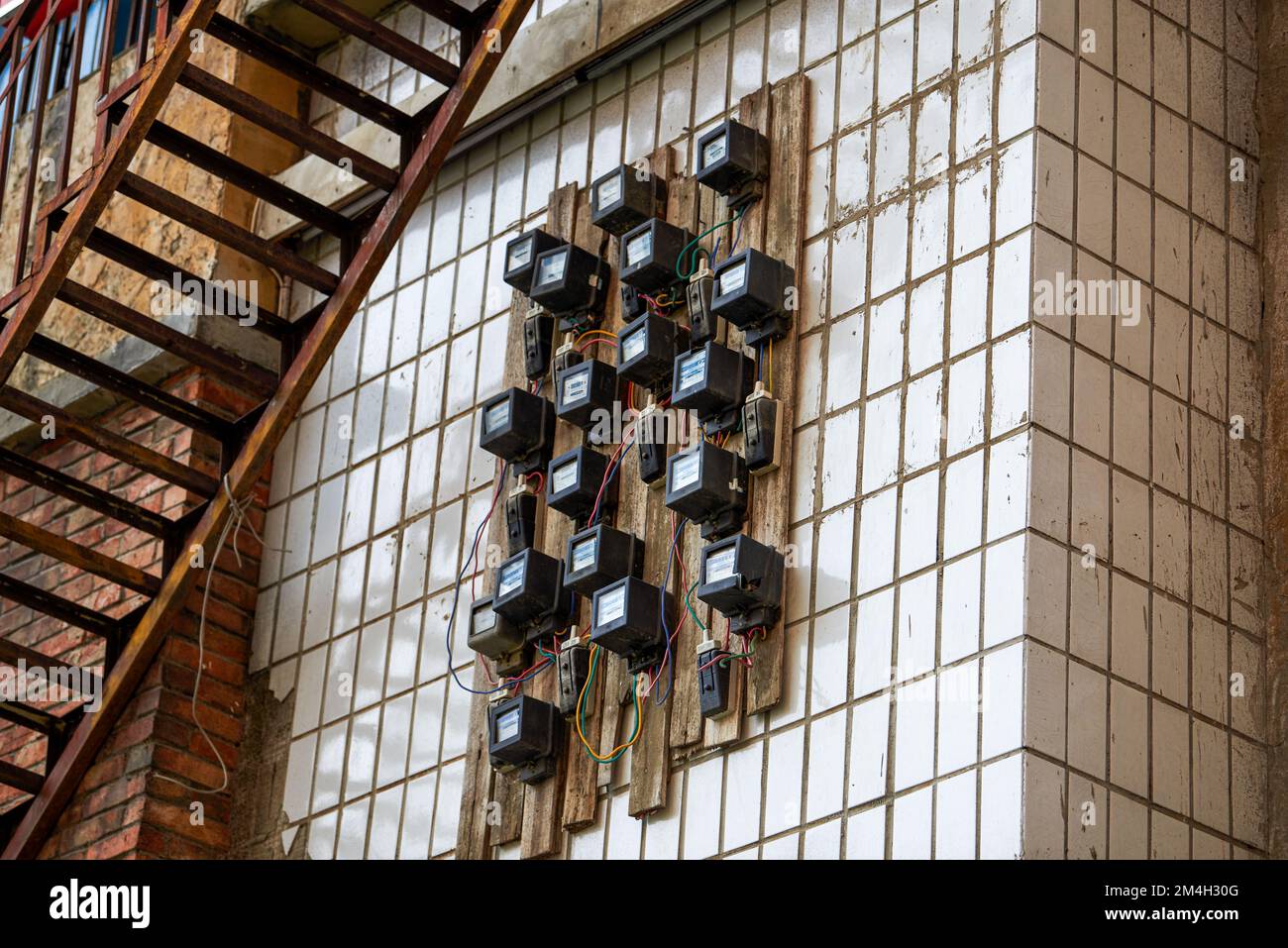 Close-up of vintage electric meter in residential building in old ...