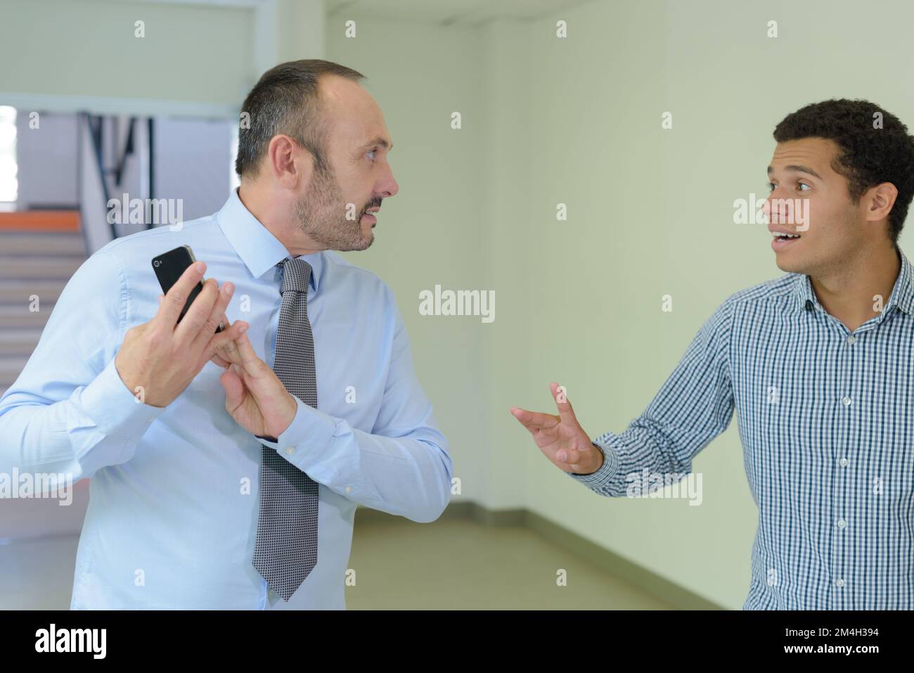 Creative business team using phones hi-res stock photography and images ...