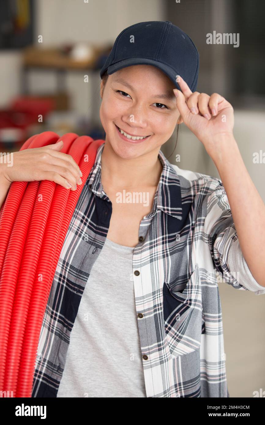 Female plumber standing hi-res stock photography and images - Alamy