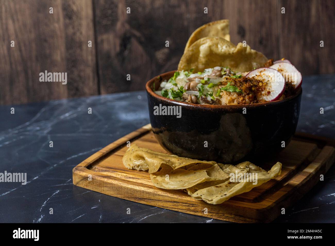 mexican food meat bowl, with meat juice cilantro and onion on the cover ...