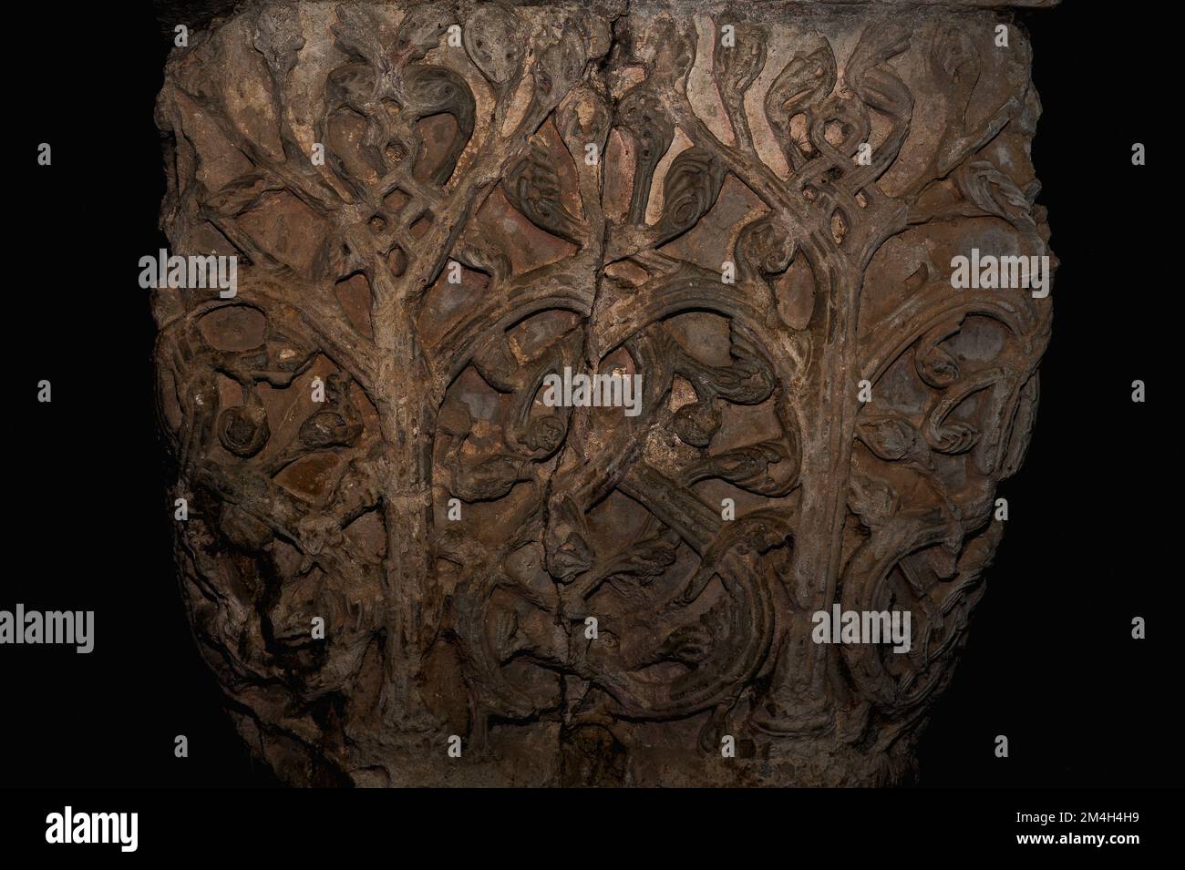 Foliage sprouts from curling and curving tree branches: medieval ...