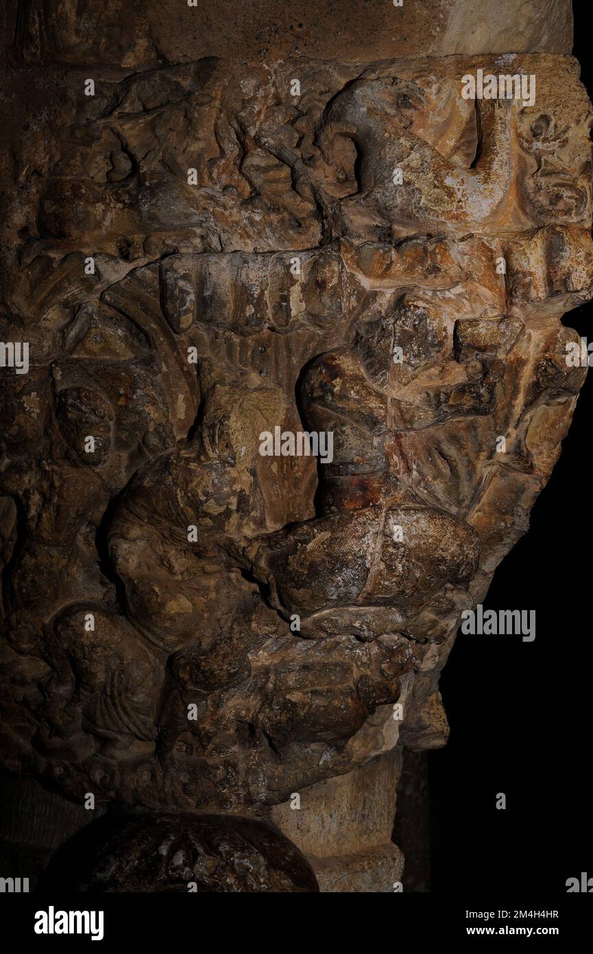 Decayed, damaged and difficult to decipher sculpted Romanesque capital ...