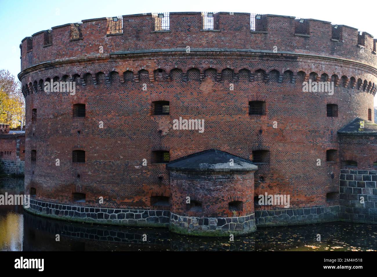 Russia, Kaliningrad, October 31, 2022.Old brick round fort with red ...