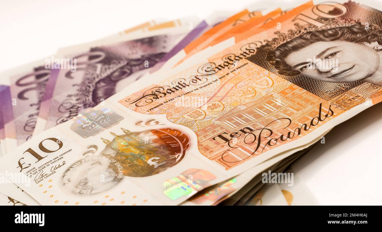 Pile of ten pound banknotes hi-res stock photography and images - Alamy