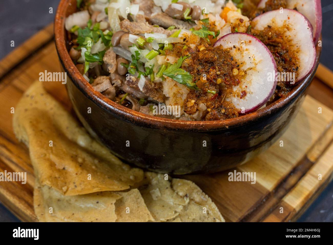 mexican food meat bowl, with meat juice cilantro and onion on the cover ...