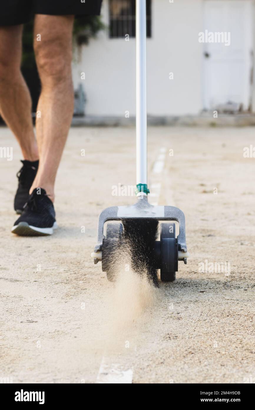Sweeping up sand hi-res stock photography and images - Alamy