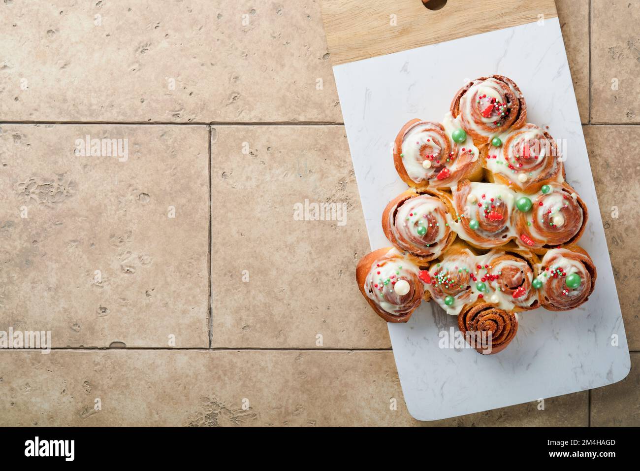 Christmas tree shape cinnamon rolls or cinnabon buns with cinnamon and ...