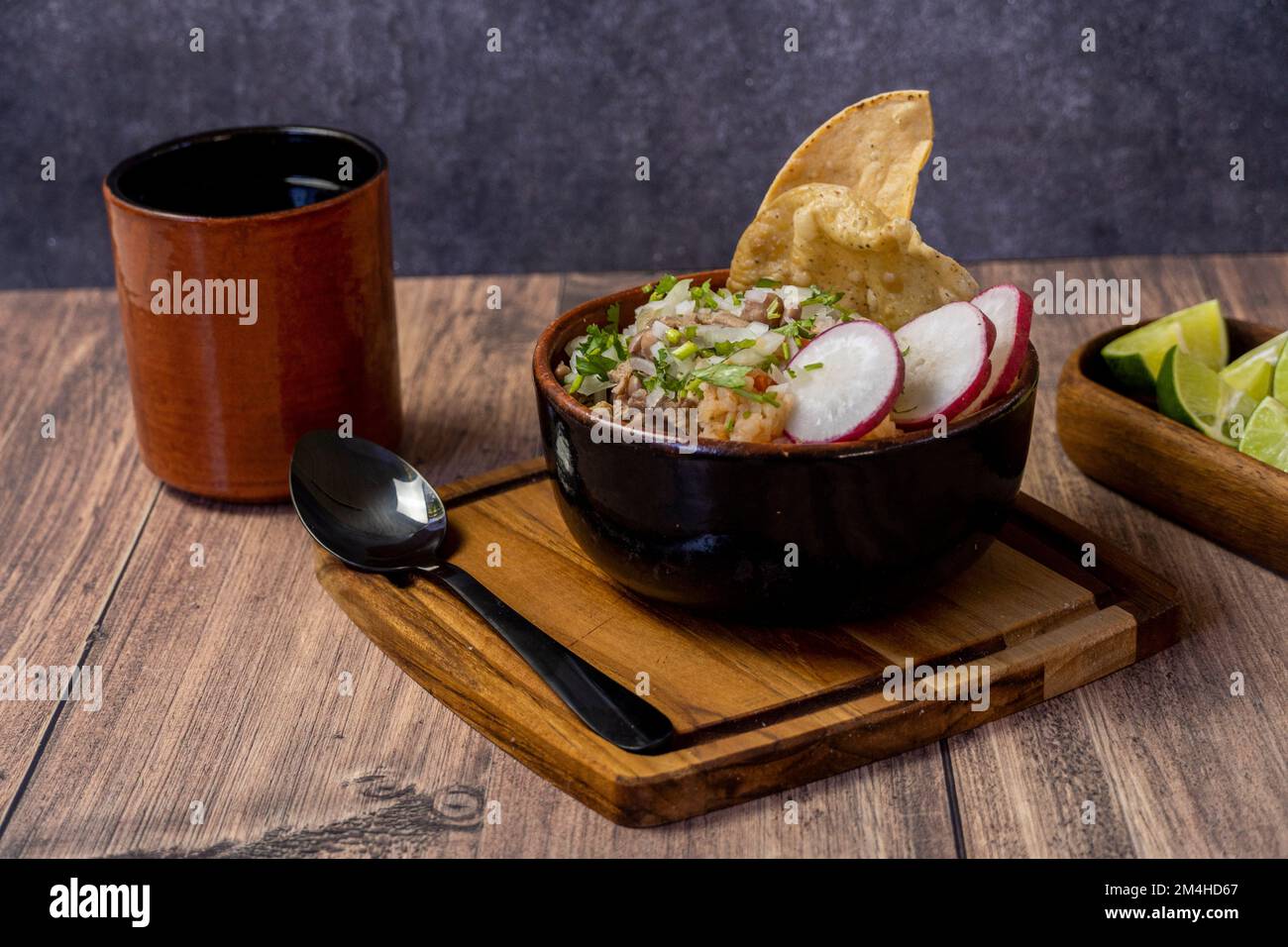mexican meat dish with avocado and lemon, meat in its juice typical ...