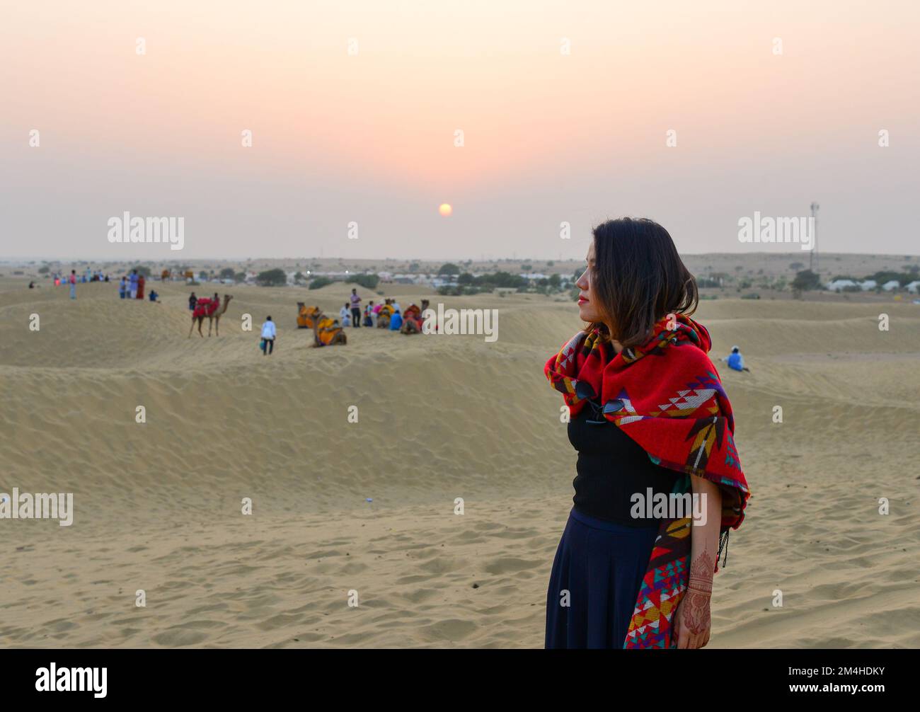 Woman standing on Thar Desert in Jaisalmer, India. Thar Desert is a ...