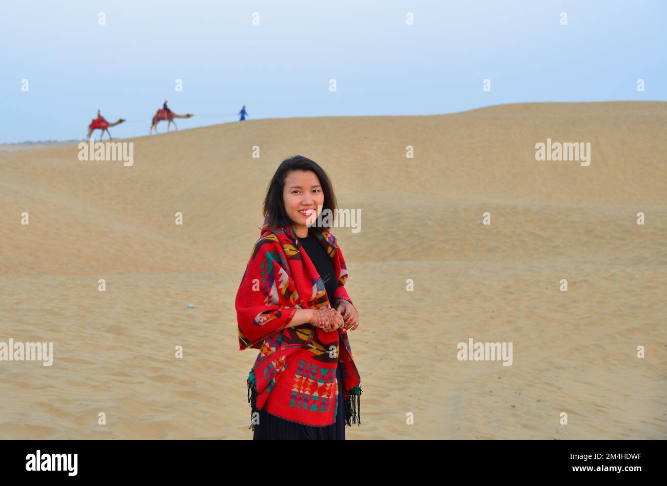 Woman standing on Thar Desert in Jaisalmer, India. Thar Desert is a ...