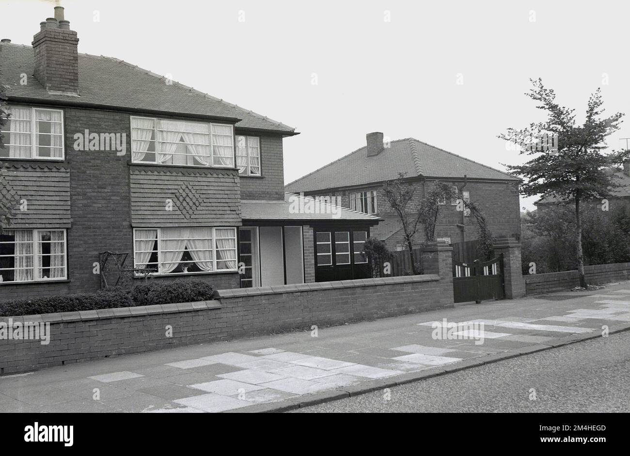 1950s, historical, exterior, a semi-detached, two-storey suburban house ...