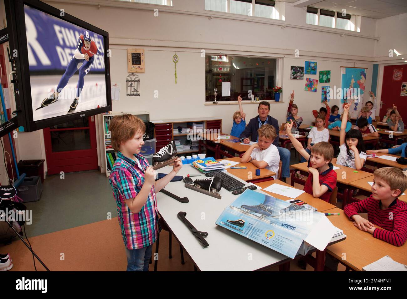 Netherlands, at primary school a boy is giving a lecture on speed ...