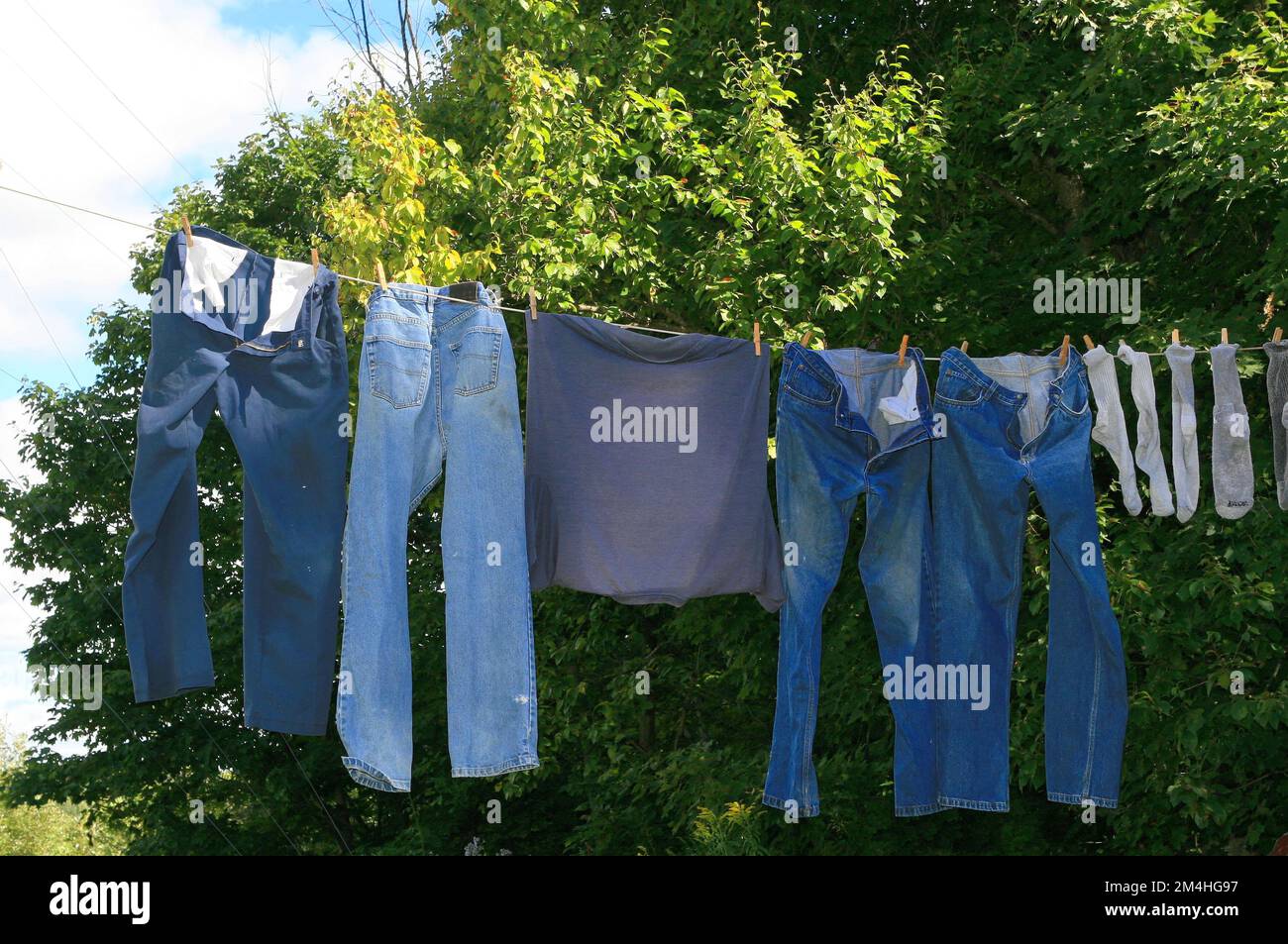Clothes drying on an outdoor clothesline. Quebec,Canada Stock Photo - Alamy