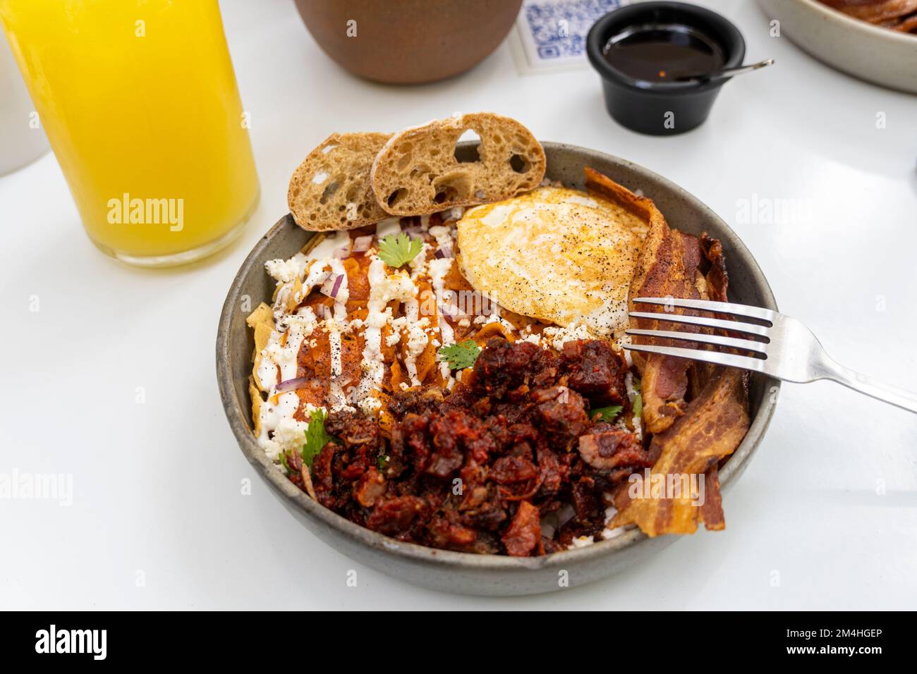 pork rinds, toasted bread and orange juice for breakfast, in the ...