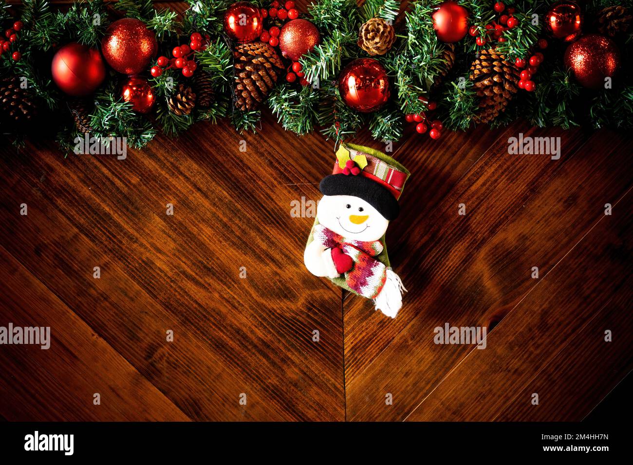 Christmas decorations and fir branches on wooden board background with ...