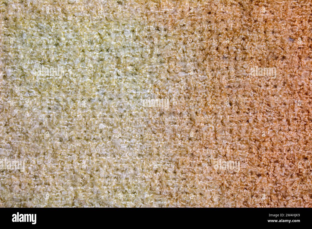 Knitted wool textile textured background in light beige creamy brown ...