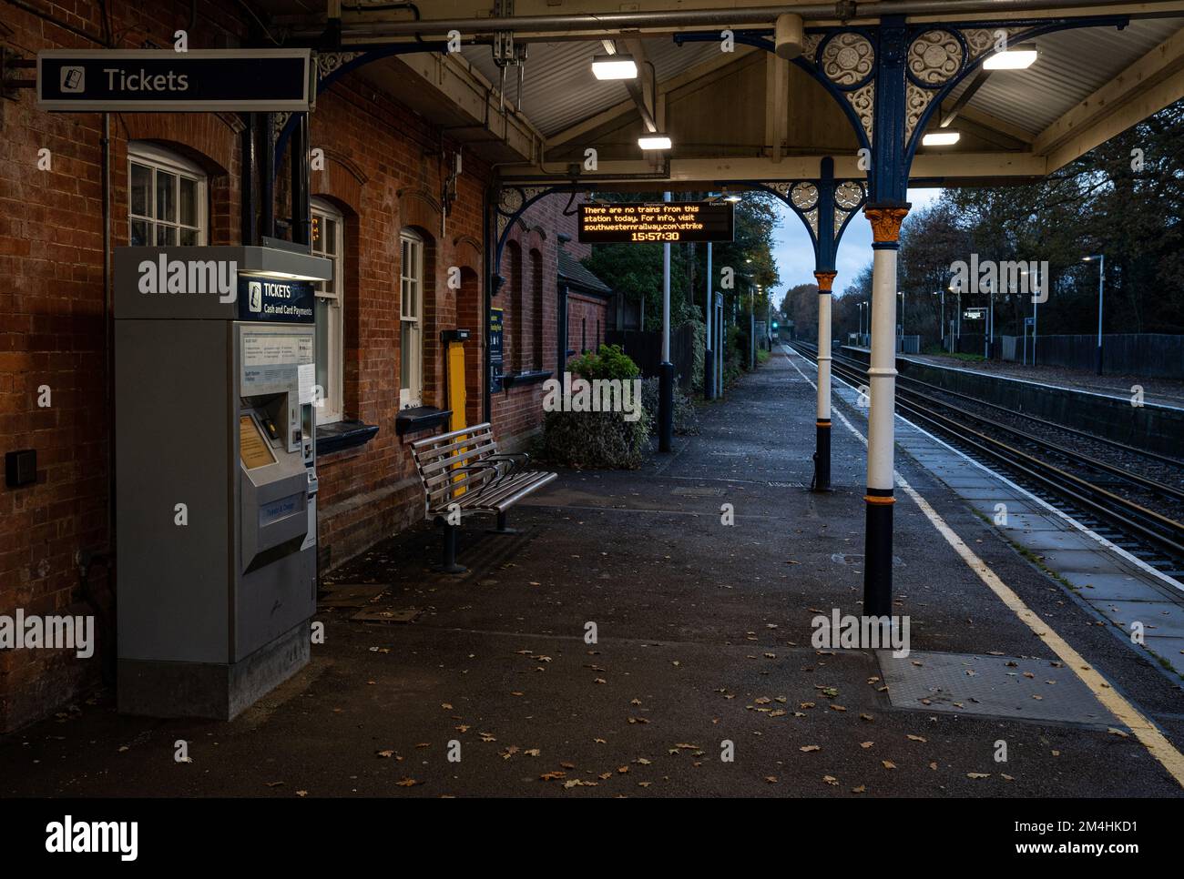 Claygate, UK. 21st Dec, 2022. a deserted platform and a sign announcing ...