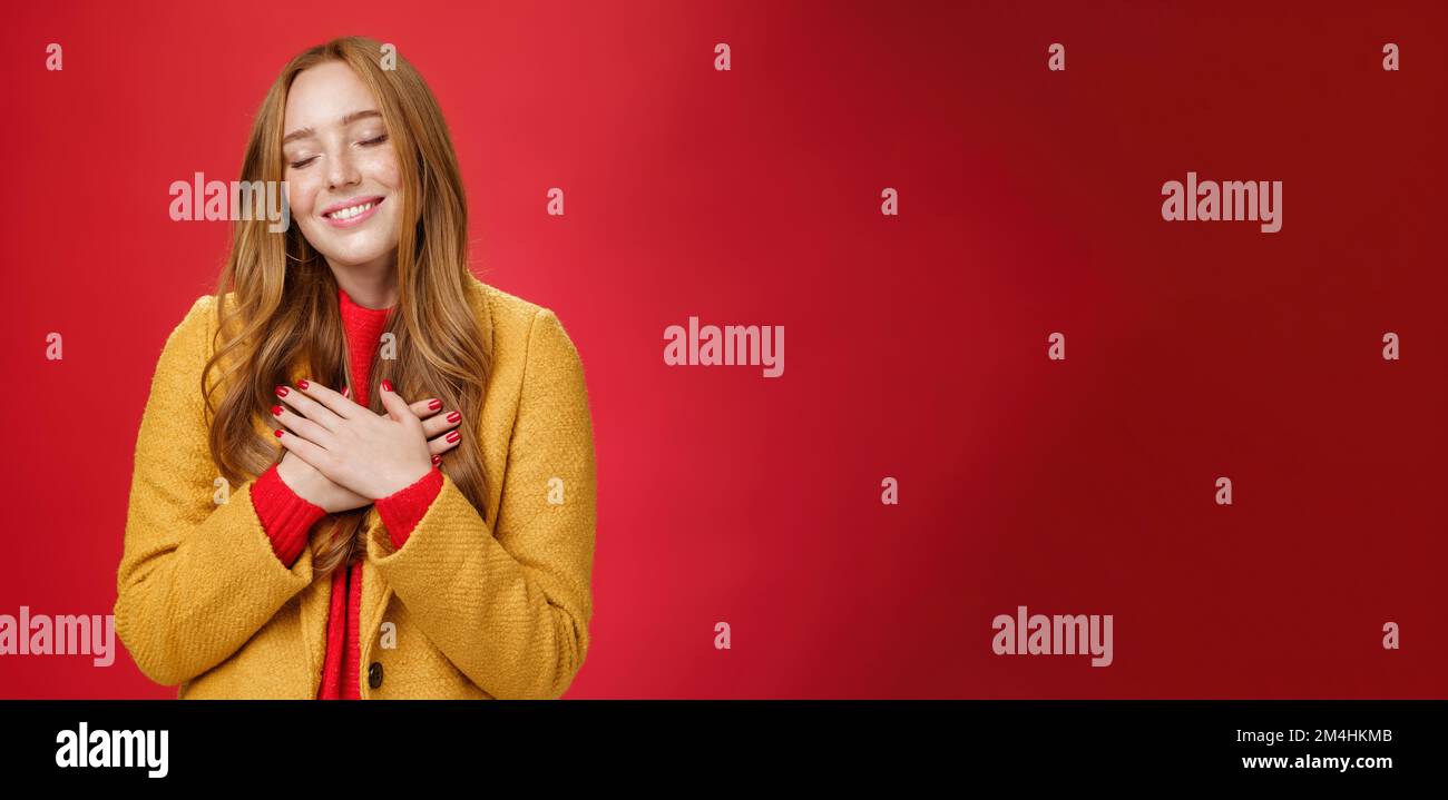 Girl feeling like heart warming as remembering sweet tender memories ...