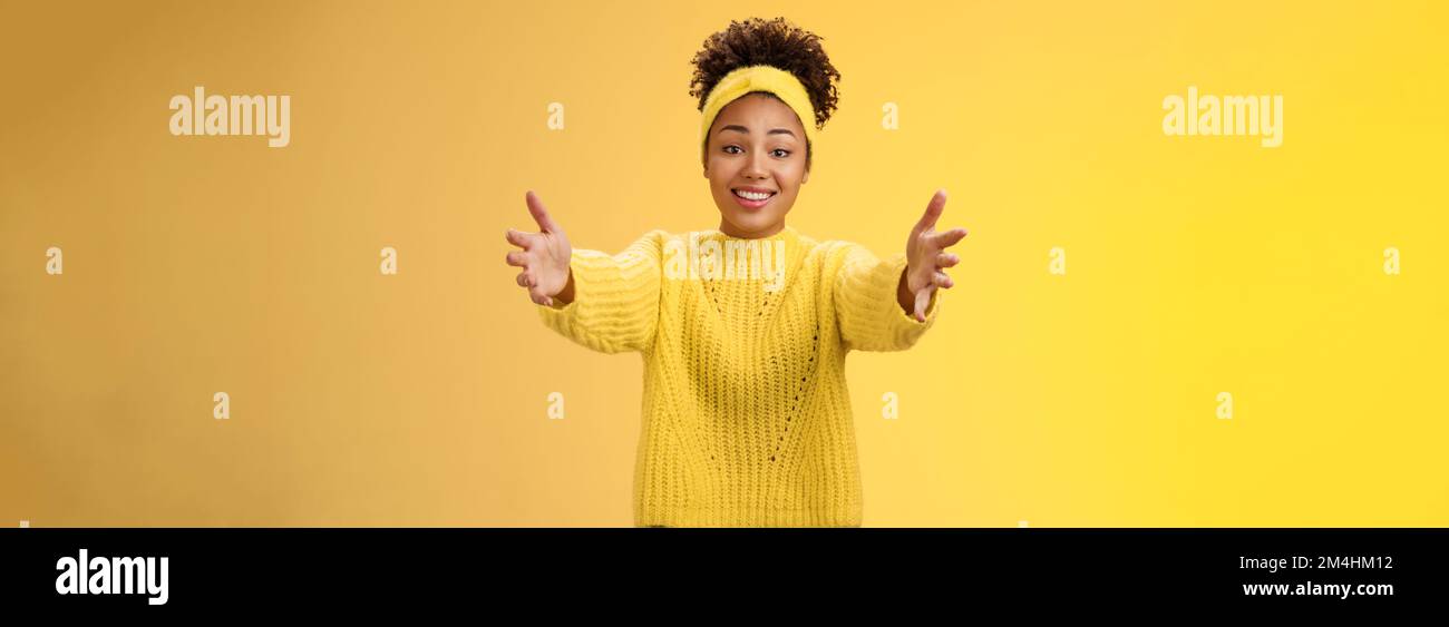 Come closer let me hug you. Touched lovely glad african-american young ...